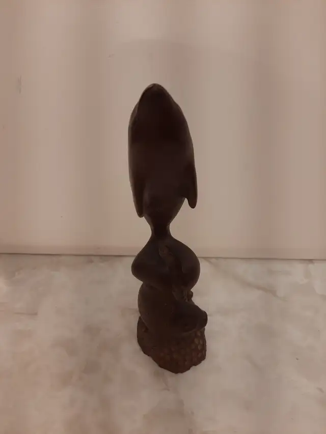 Hand-carved wooden dolphin and gold fish sculpture. | Arts ...