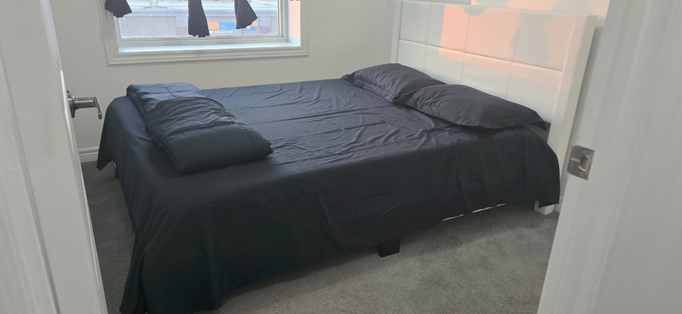 Bedroom with a queen size bed set available in 2bedrooms Apart | Long ...