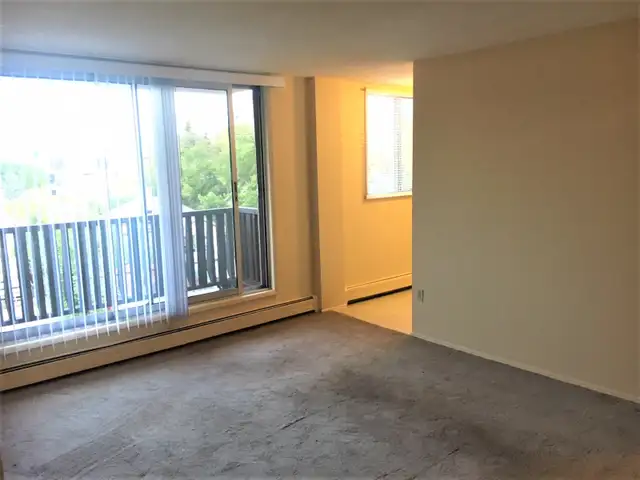 Super large corner 2 bed apartment in Kensington, close to LRT 4 | Room ...