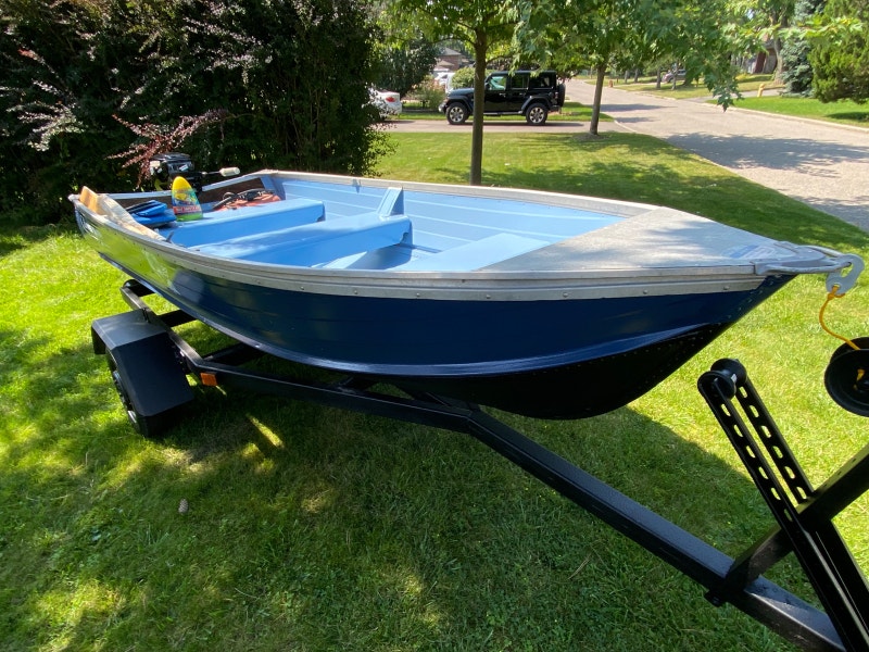 12 ft deep aluminum boat - 9.9 evinrude - bunker trailer | Powerboats ...